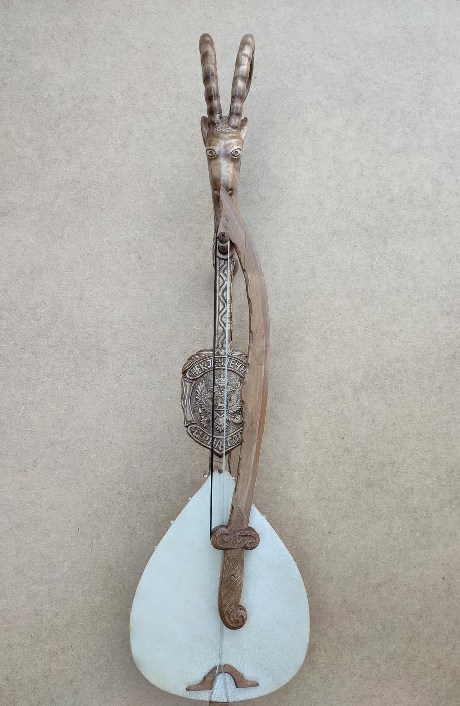 Gusle with goat (the coat of arms of Montenegro, monument to the heroes ...