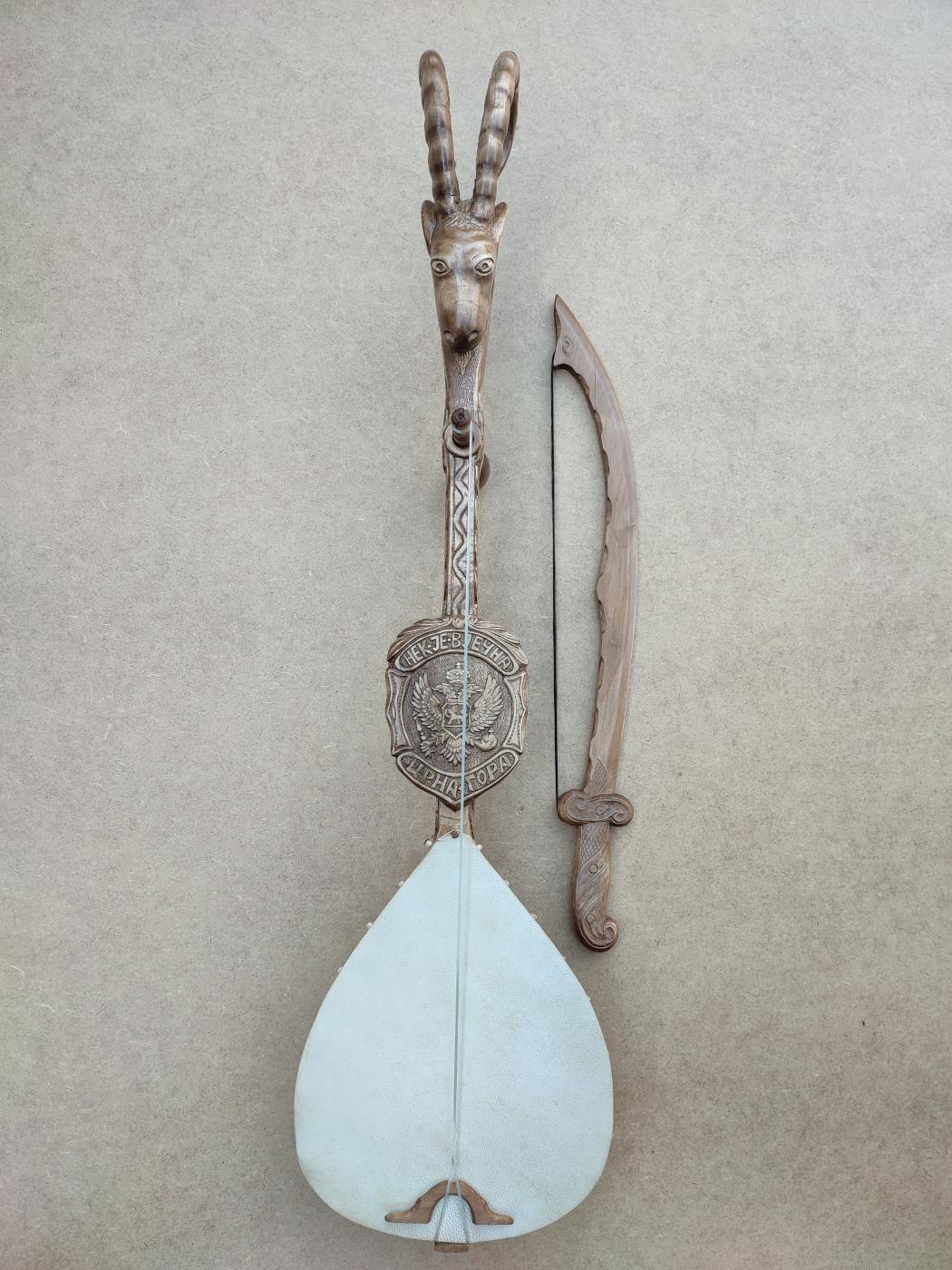 Gusle with goat (the coat of arms of Montenegro, monument to the heroes ...